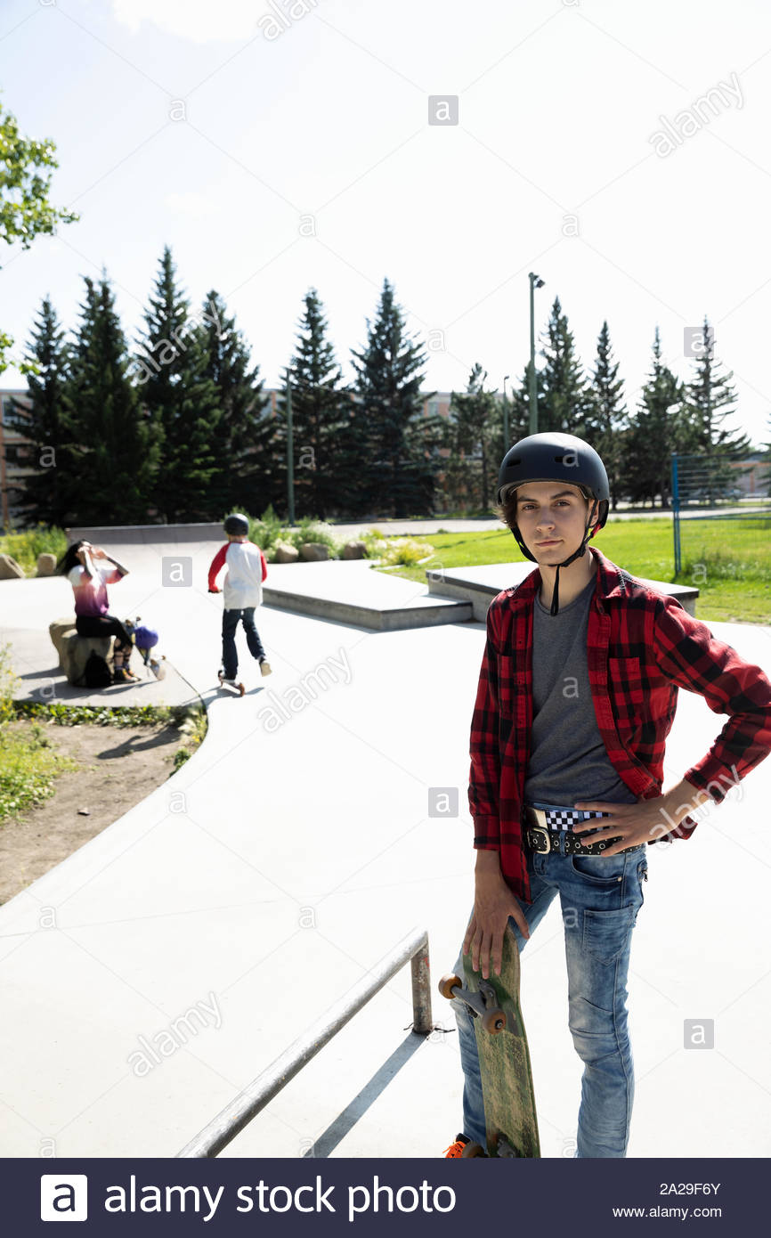 Boy with skateboard in the skate park hi-res stock photography and ...