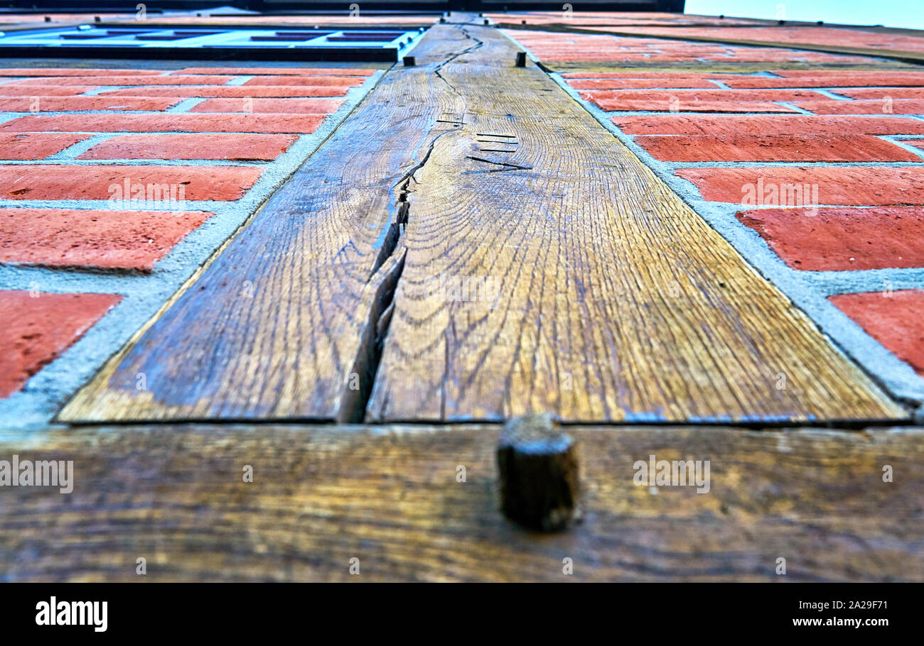 Old timber frame with old red bricks and blurred foreground Stock Photo ...