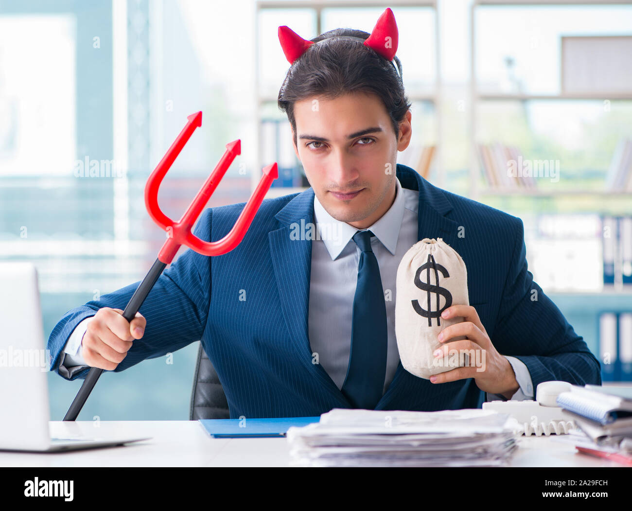 Devil angry businessman in the office Stock Photo - Alamy