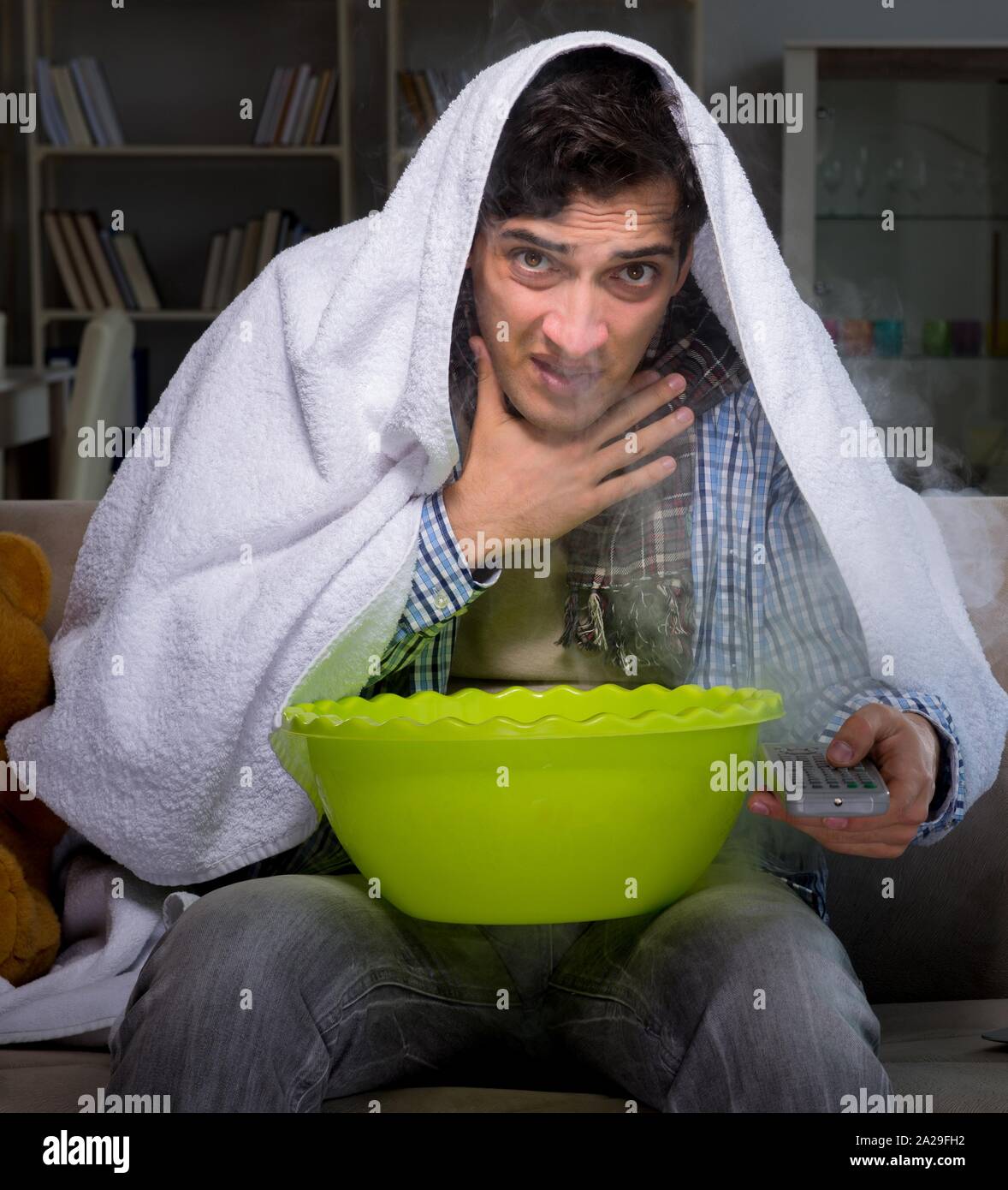 The sick man doing inhalation at night in home Stock Photo - Alamy