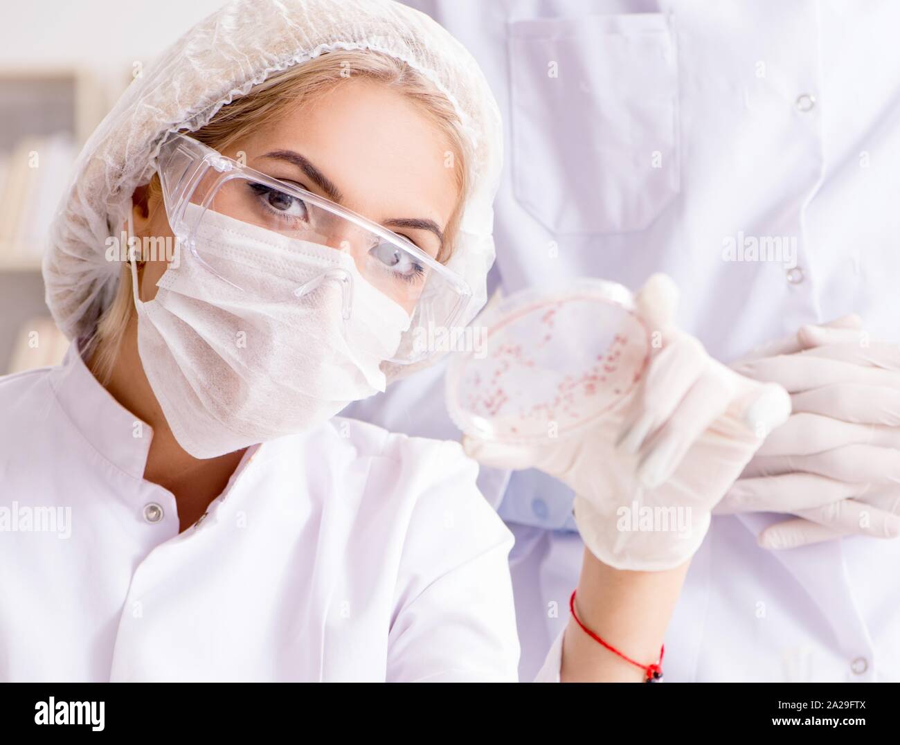 The young female woman doctor in hospital clinic lab Stock Photo - Alamy