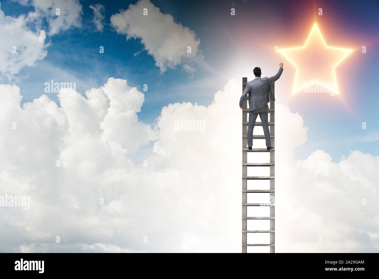 The businessman reaching out for stars Stock Photo - Alamy