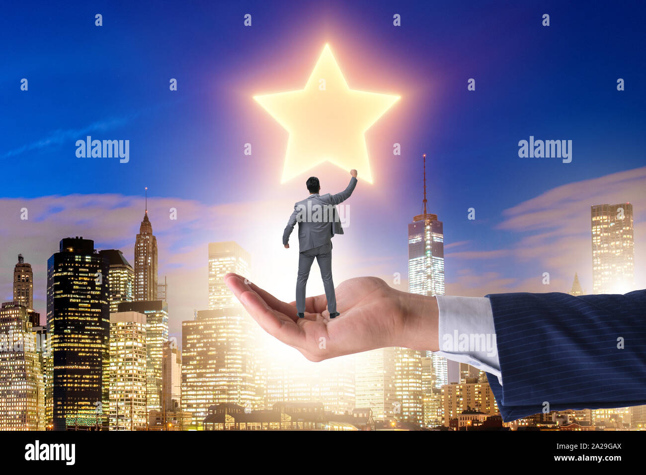 The businessman held on hand reaching out for stars Stock Photo - Alamy