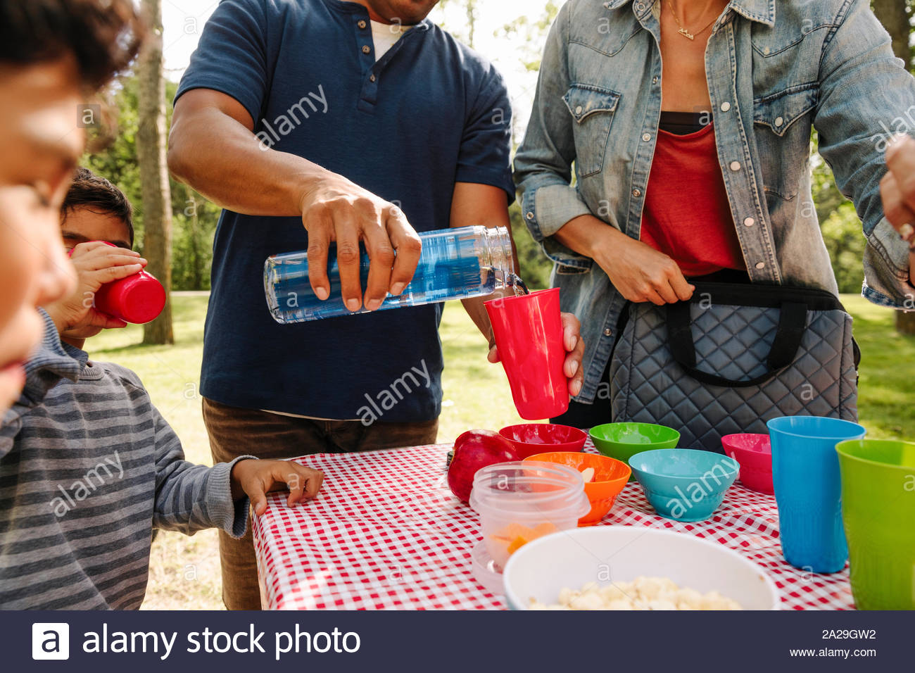 Family water drink hi-res stock photography and images - Alamy