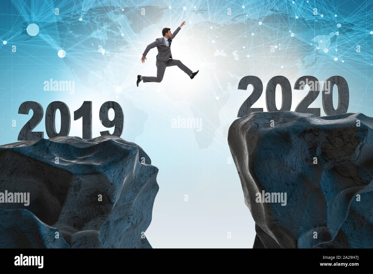 The businessman jumping from year 2019 to 2020 Stock Photo - Alamy