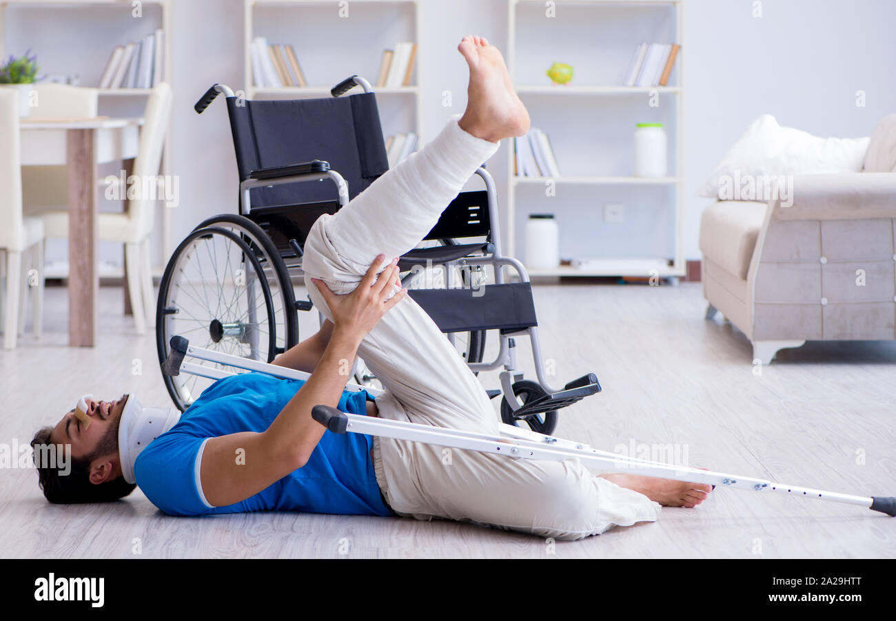 The injured young man recovering at home Stock Photo - Alamy