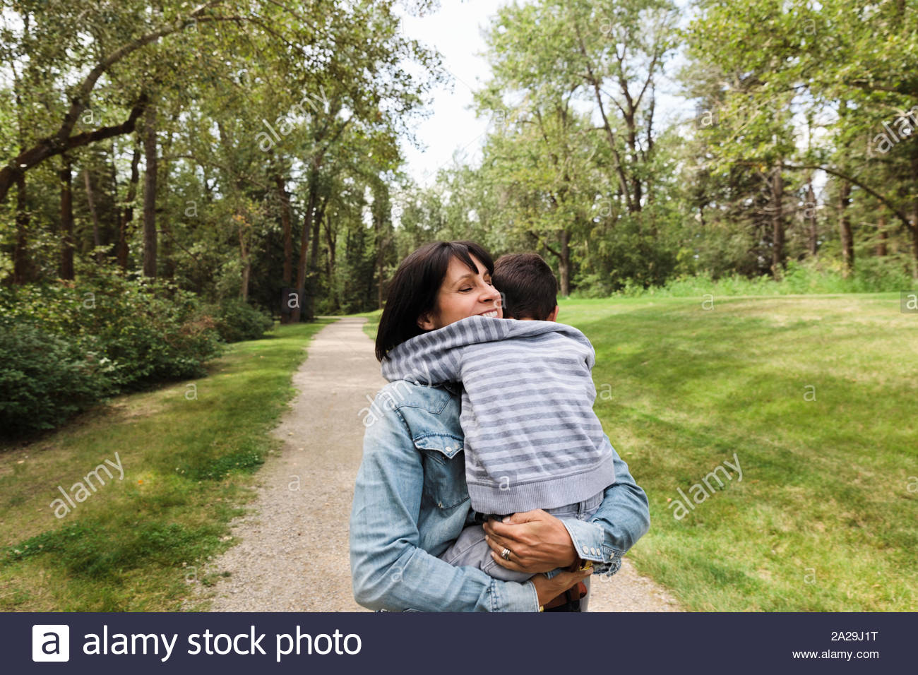 Son mother hugging hi-res stock photography and images - Alamy