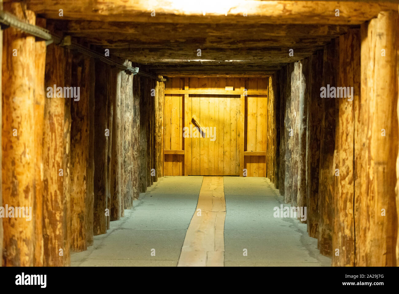 Salt caves near Krakow. Underground corridor with vestibule door ...