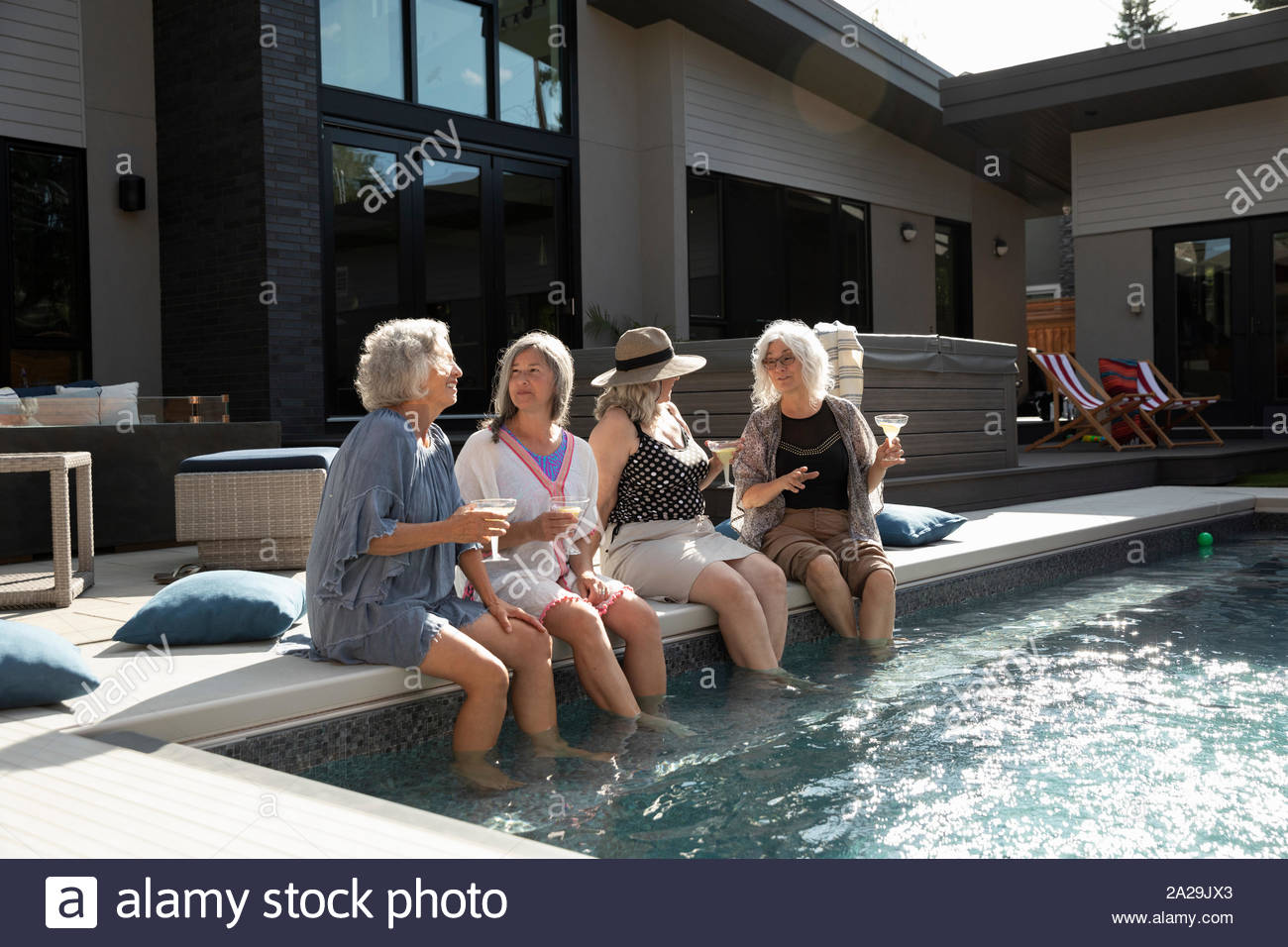 Women pool drinking hi-res stock photography and images - Alamy