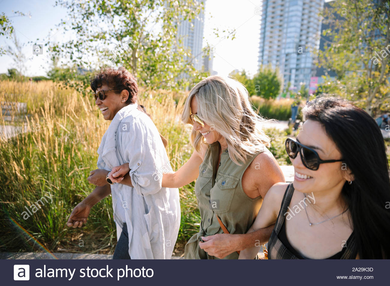 Woman walking arm hi-res stock photography and images - Alamy