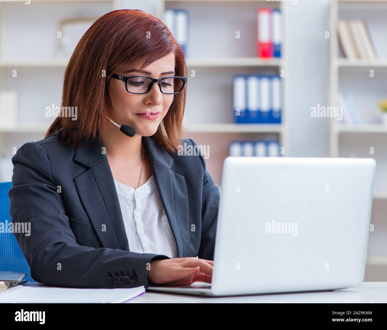 The call center operator working with clients Stock Photo - Alamy