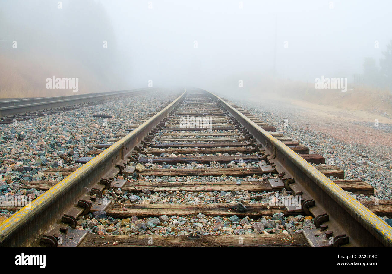 Train Tracks in the Fog - Colorado Stock Photo - Alamy