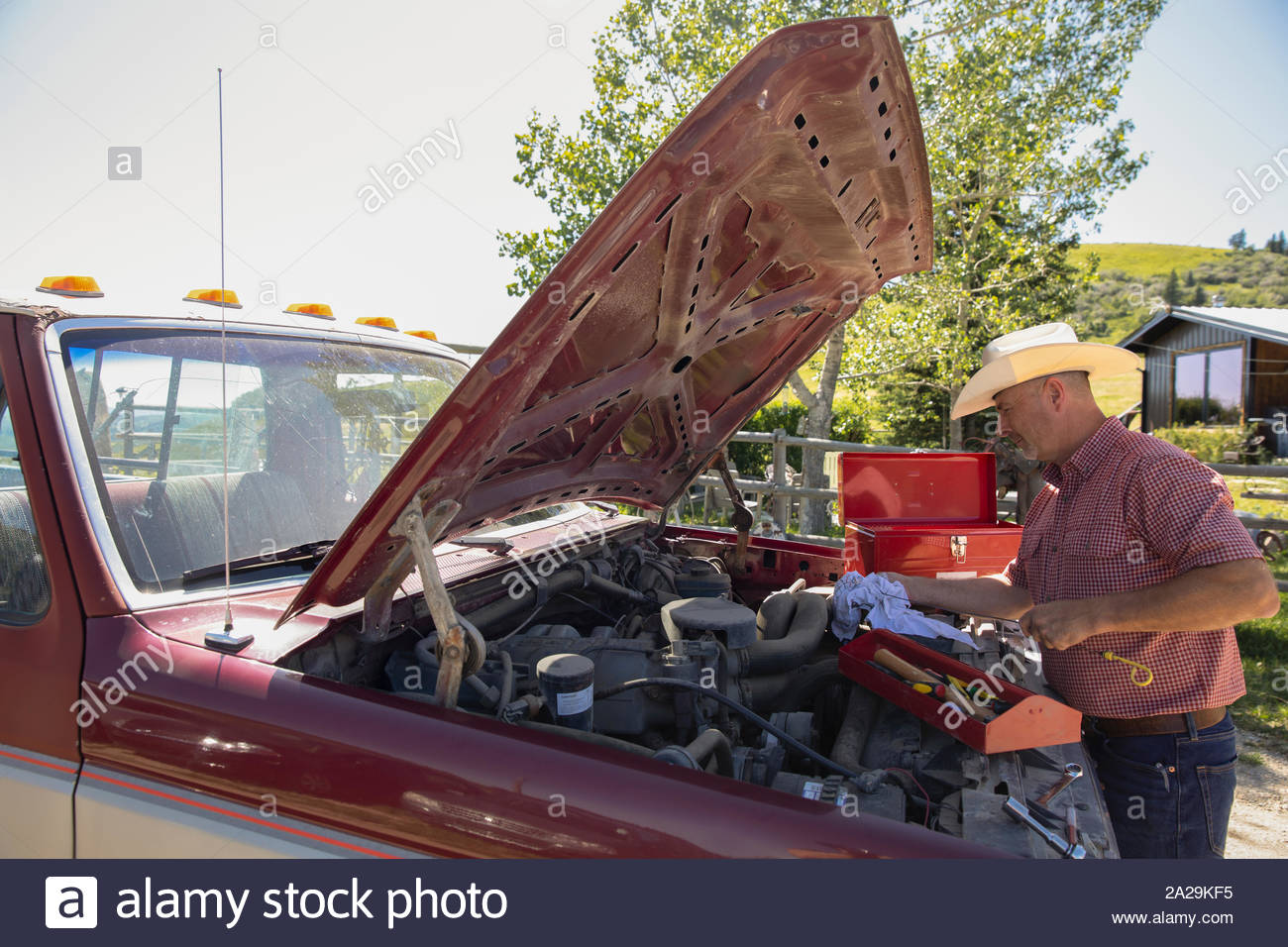 Checking oil with dipstick hi-res stock photography and images - Alamy