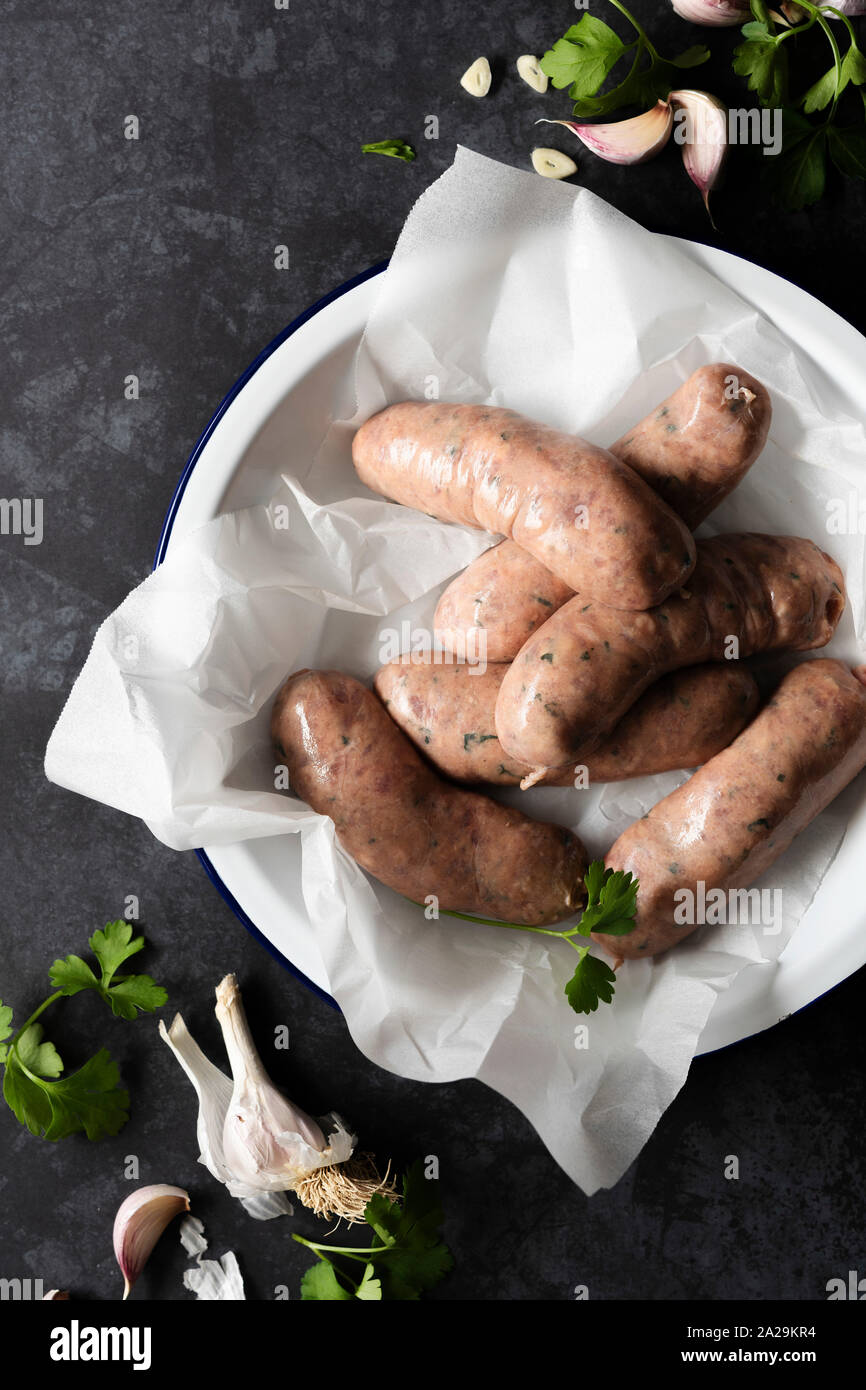 Raw Angus Beef sausages seasoned with garlic and parsley Stock Photo ...