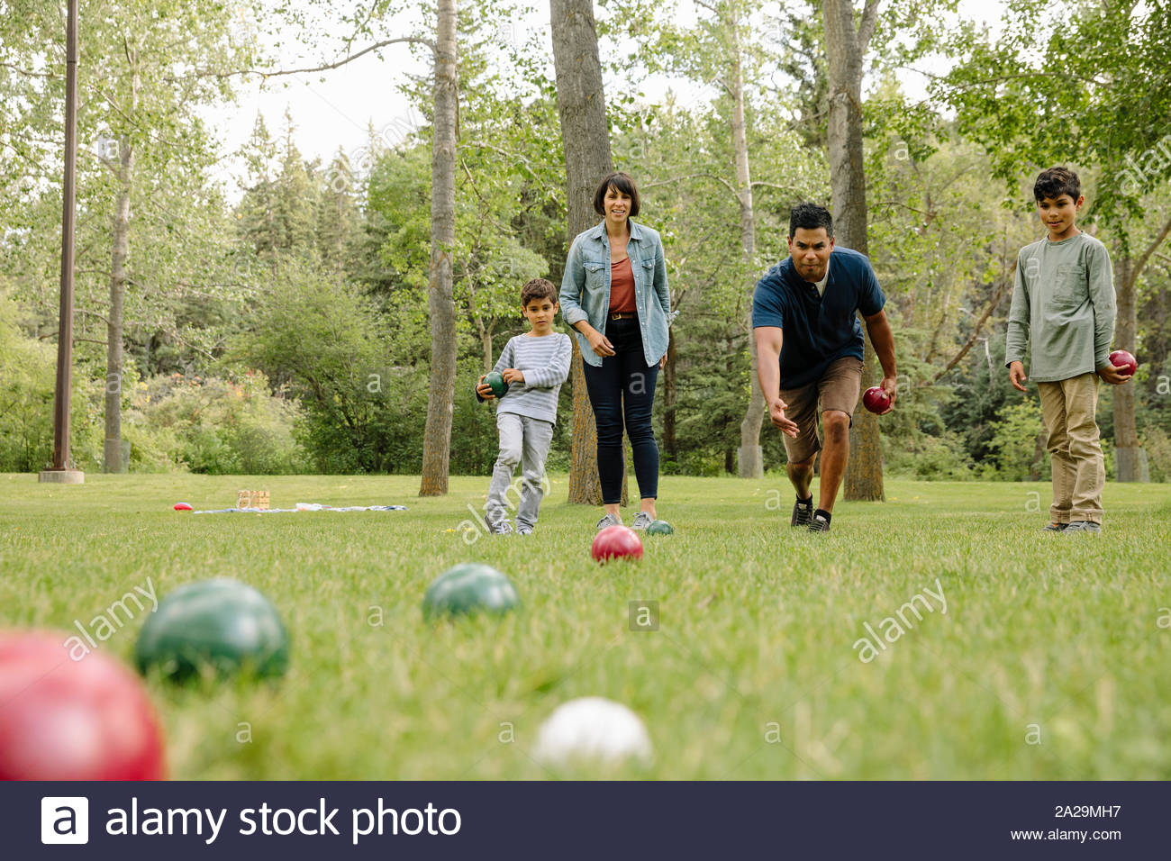 Children playing ball park hi-res stock photography and images - Alamy