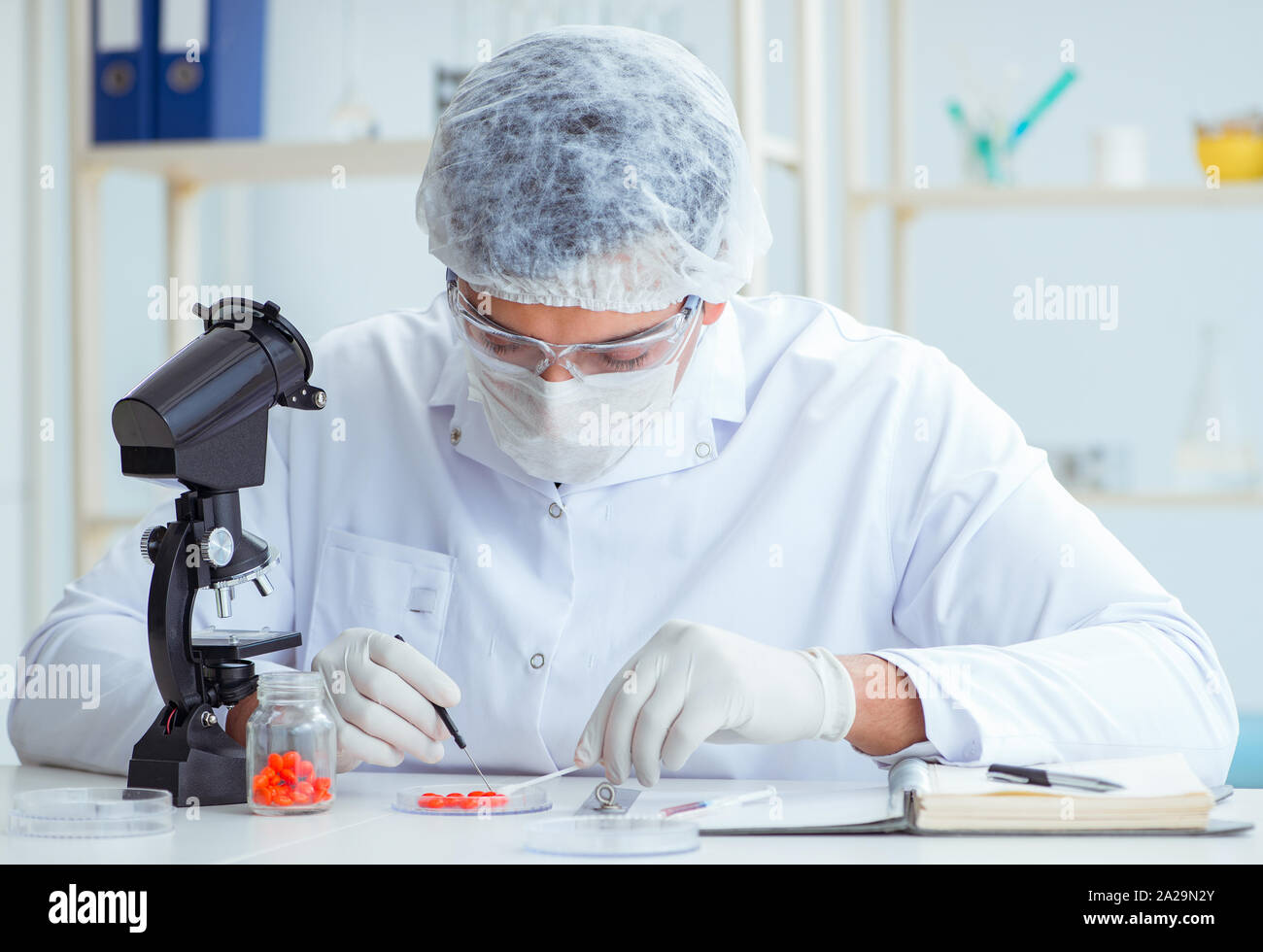 The doctor testing new drugs for medical purposes Stock Photo - Alamy