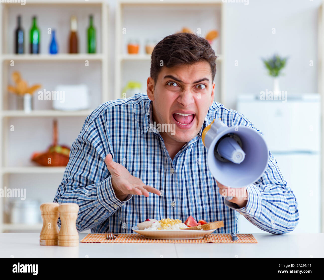 Wife dinner husband unhappy hi-res stock photography and images - Alamy
