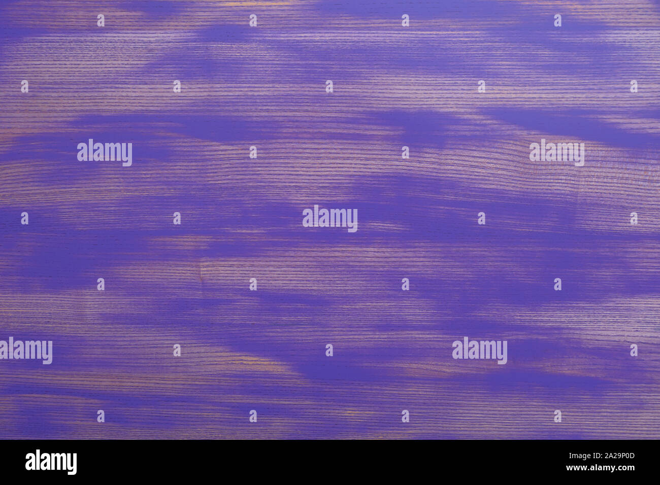 Wood panel painted in bright colors with aging effect. Wiped paint ...