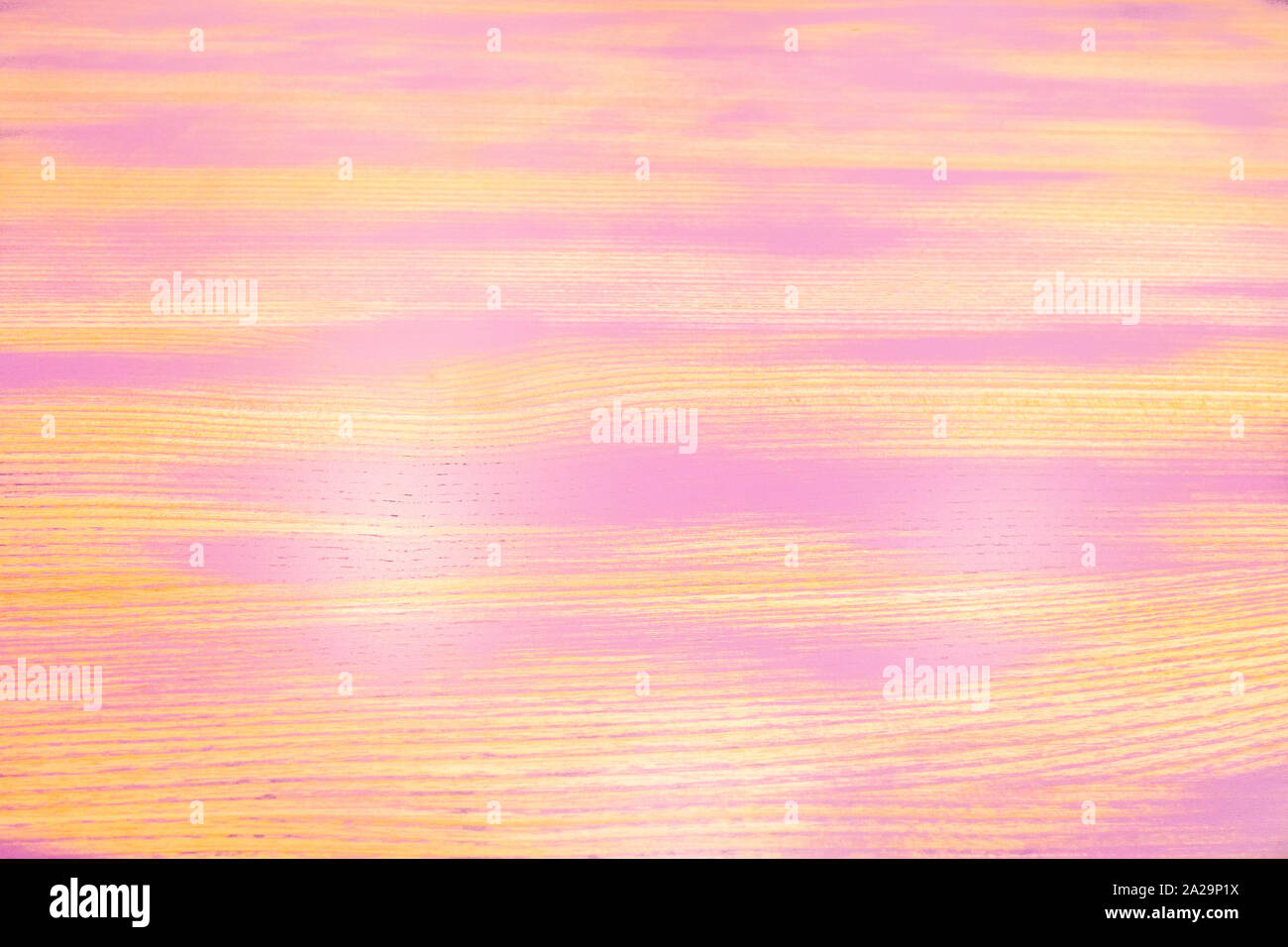 Wood panel painted in bright colors with aging effect. Wiped paint ...