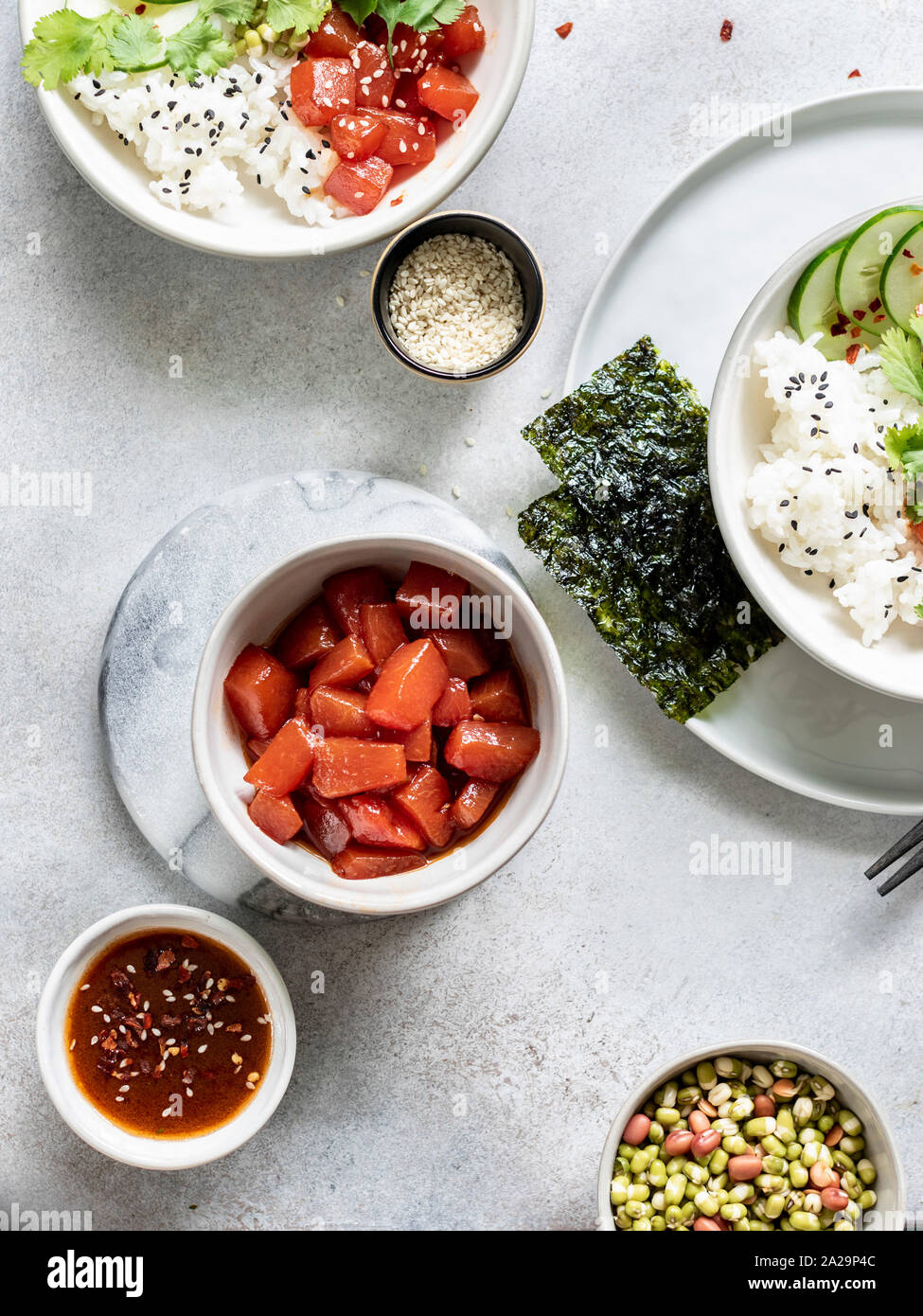 Sauteed watermelon poke bowl served with rice, cucumbers, and sprouted ...