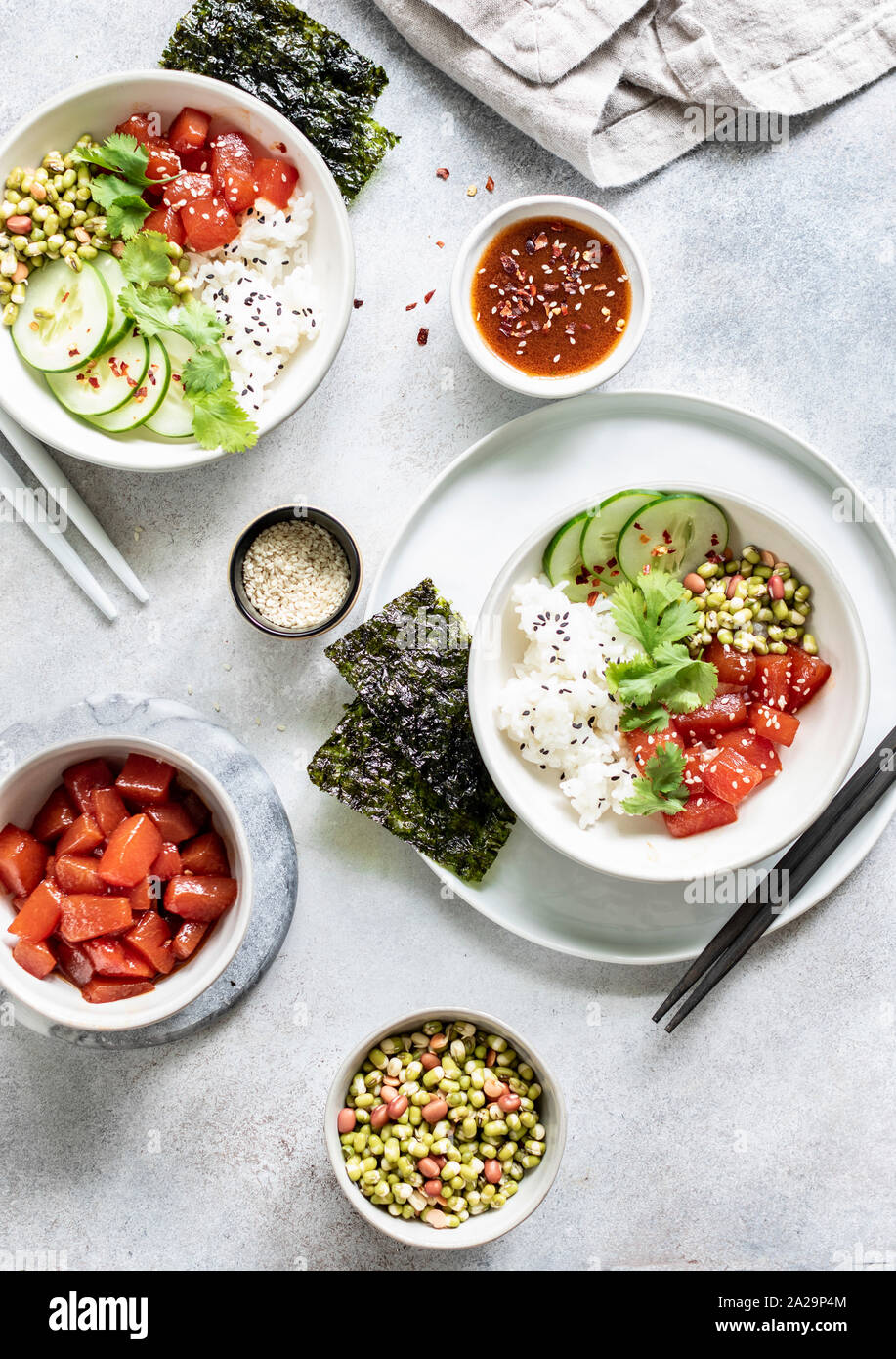 Sauteed watermelon poke bowl served with rice, cucumbers, and sprouted ...