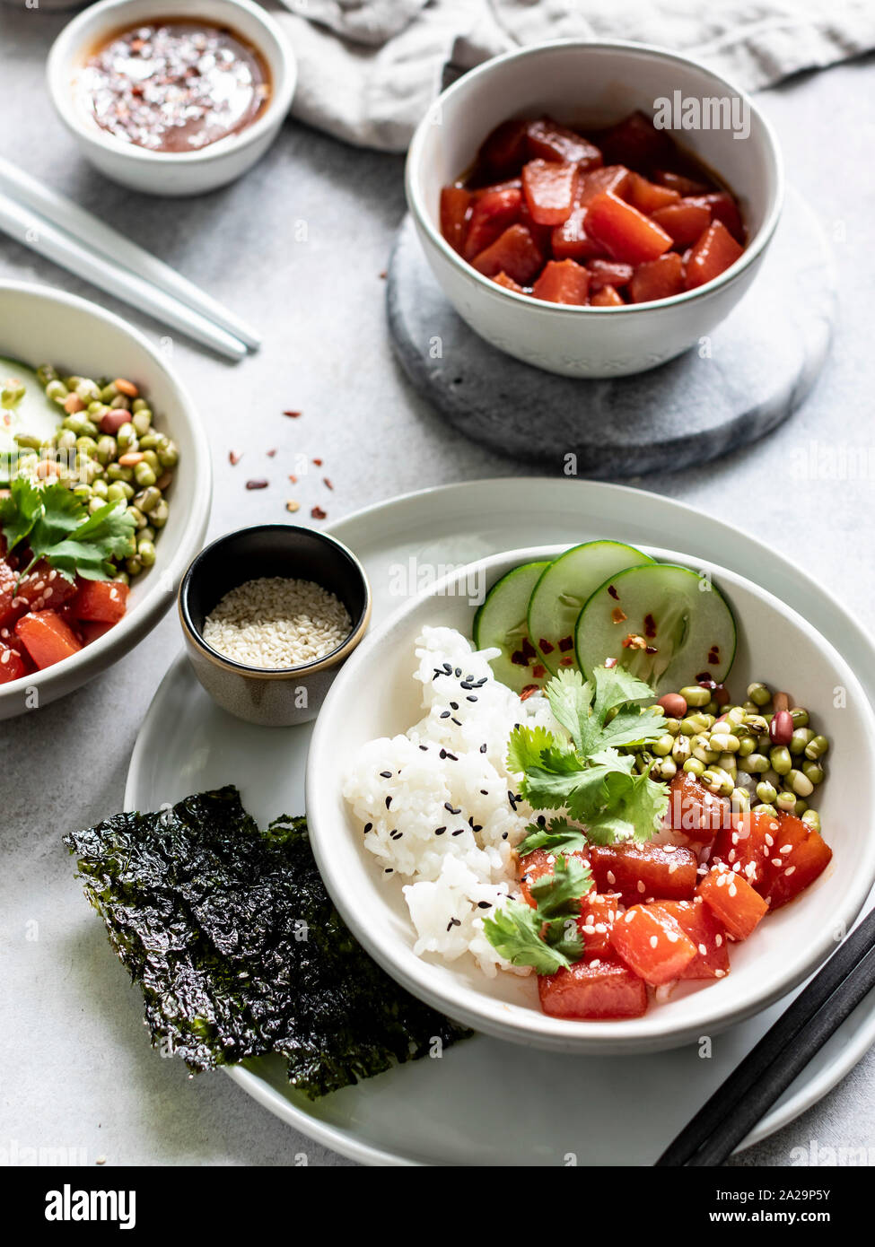 Sauteed watermelon poke bowl served with rice, cucumbers, and sprouted ...