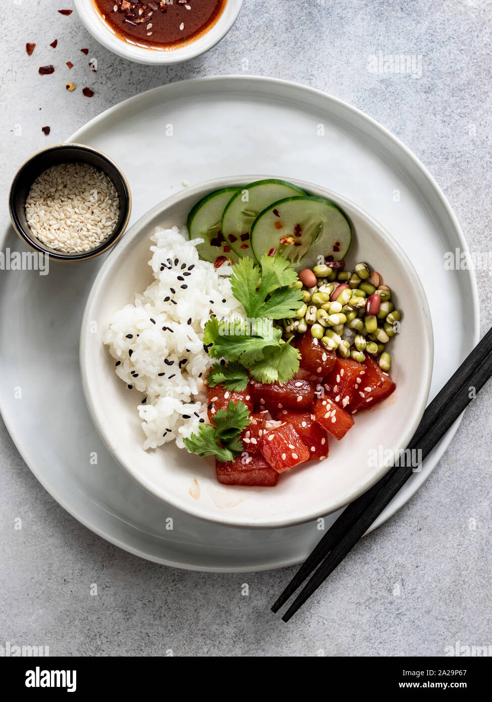 Sauteed watermelon poke bowl served with rice, cucumbers, and sprouted ...