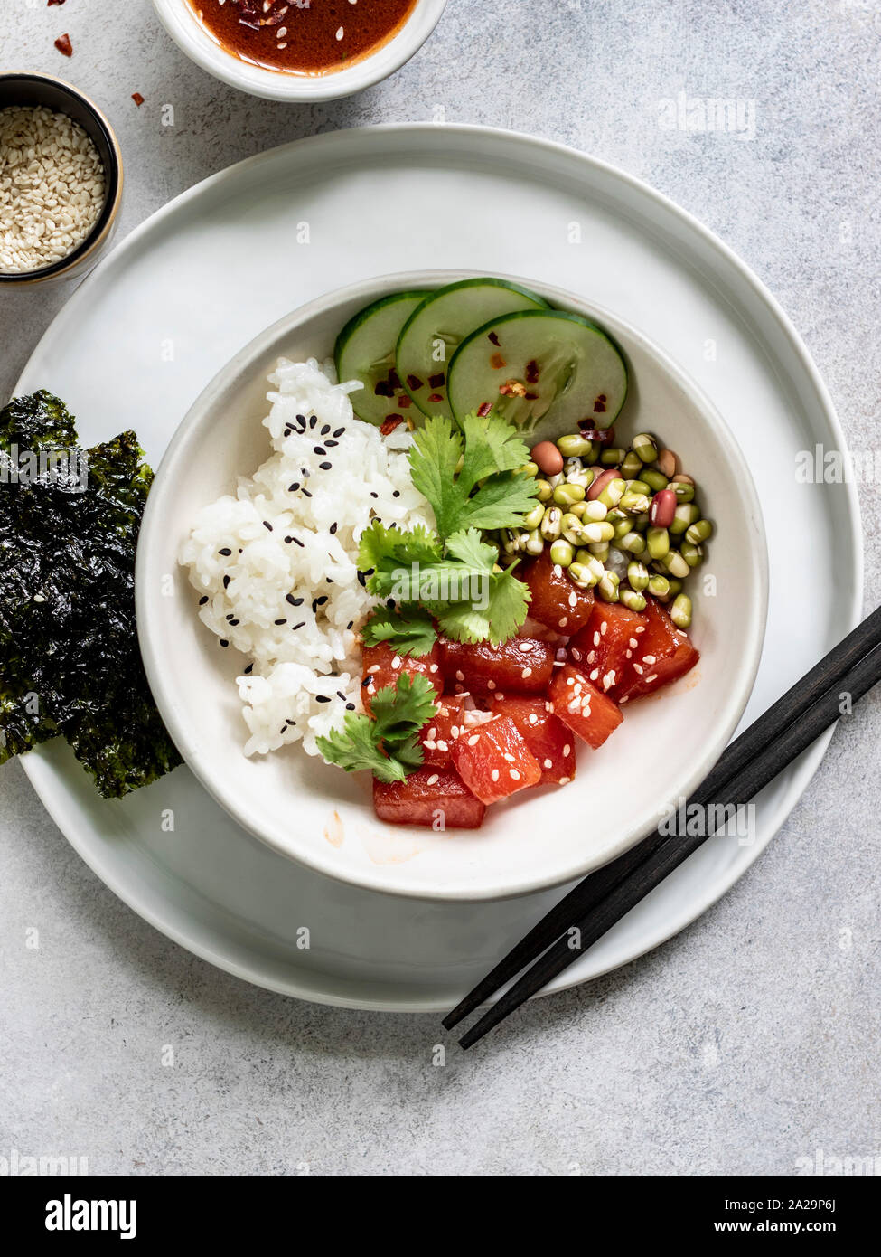 Sauteed watermelon poke bowl served with rice, cucumbers, and sprouted ...