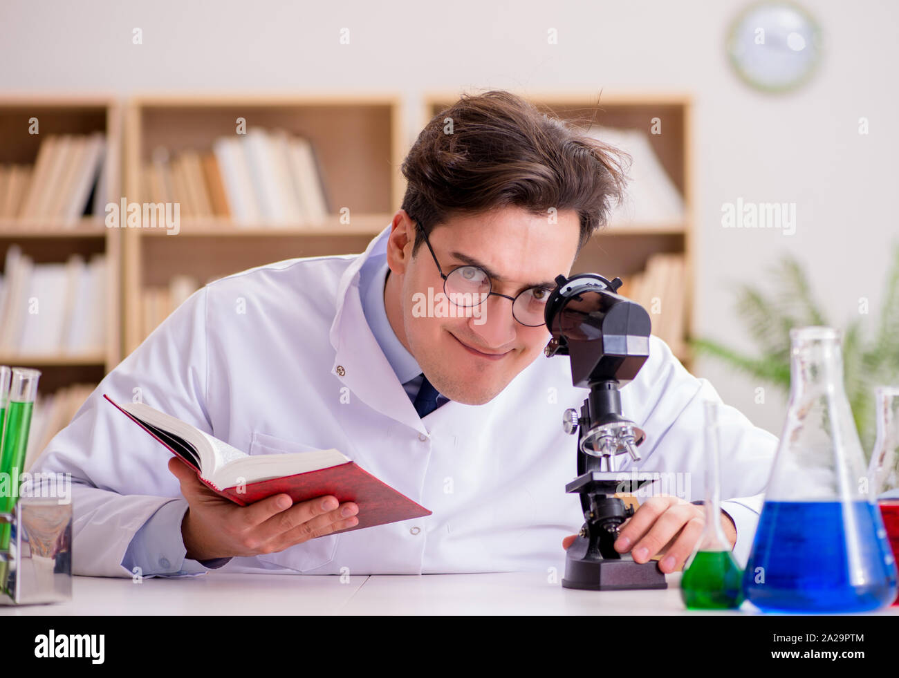 The mad crazy scientist doctor doing experiments in a laboratory Stock ...