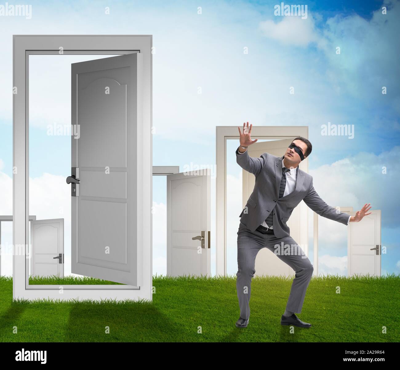 The confused businessman in front of doors Stock Photo - Alamy