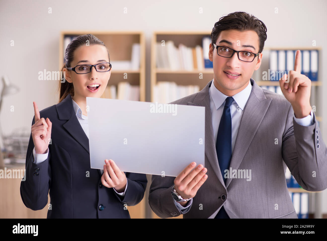 The businessman and businesswoman having discussion in office Stock ...