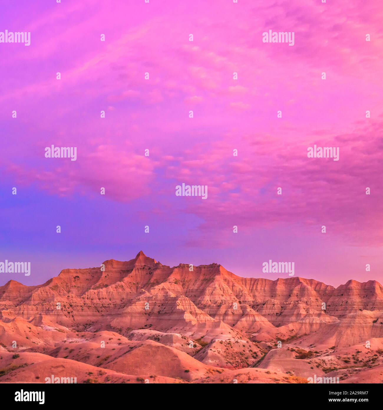 sunrise over the yellow mounds area of badlands national park near wall ...