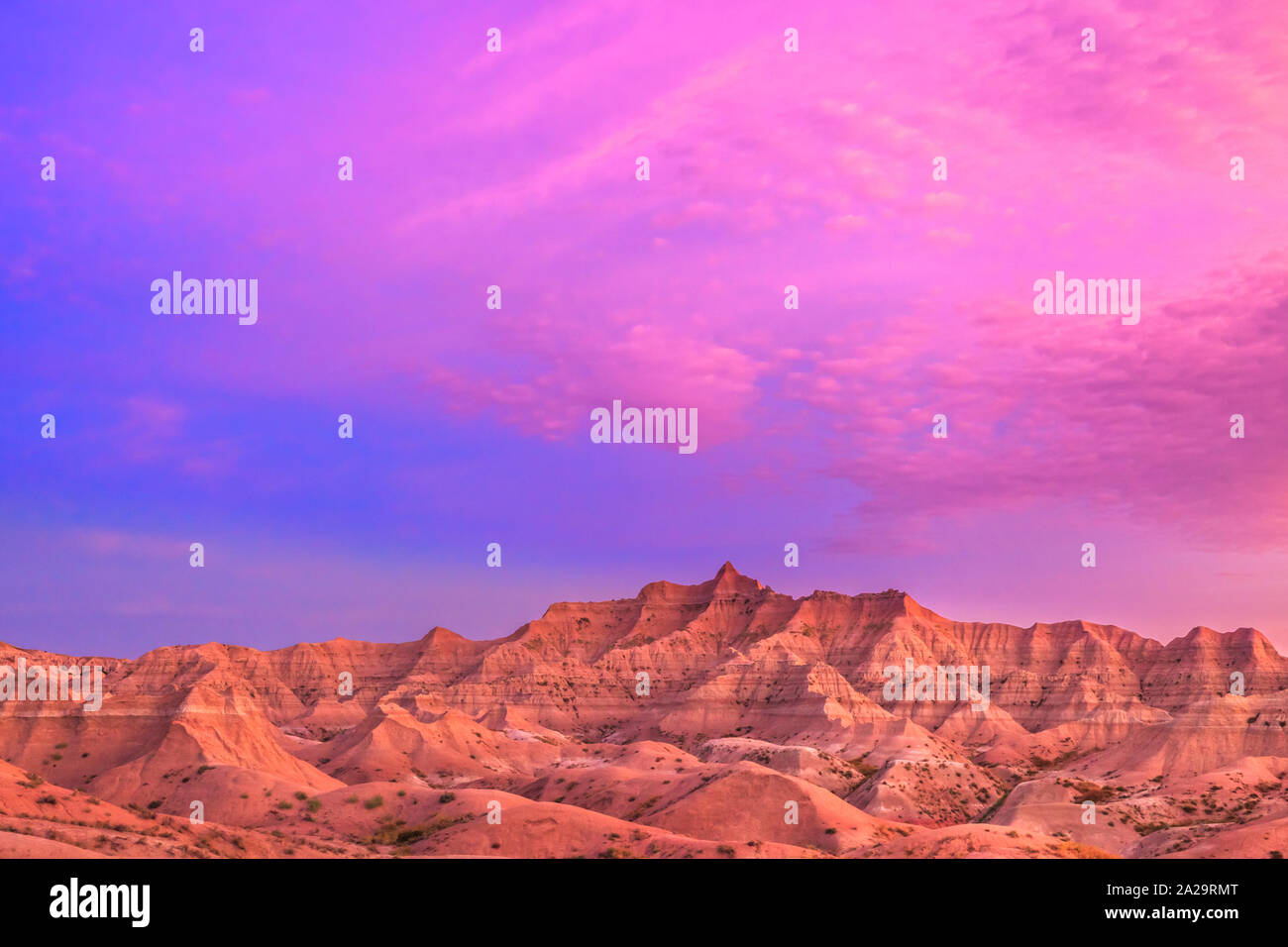 sunrise over the yellow mounds area of badlands national park near wall ...