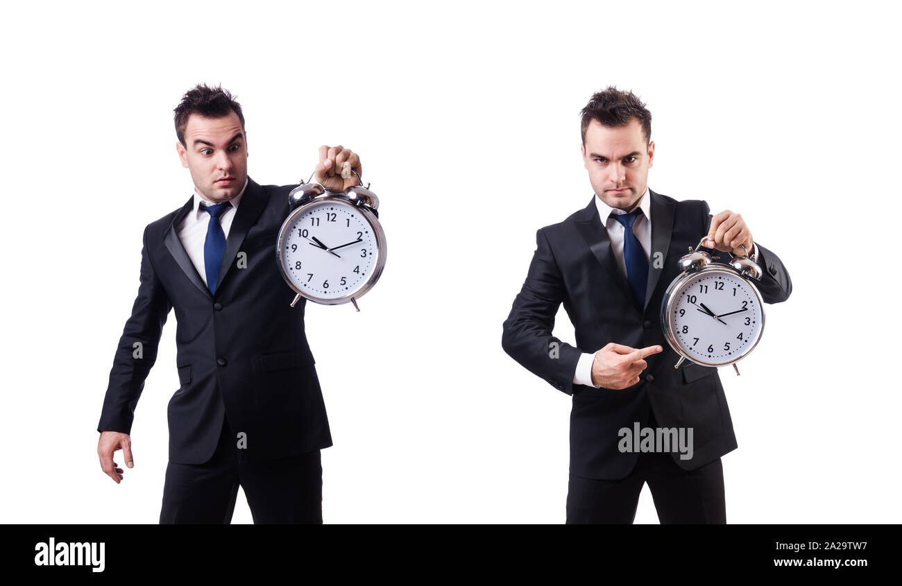 The man with alarm clock isolated on white Stock Photo - Alamy