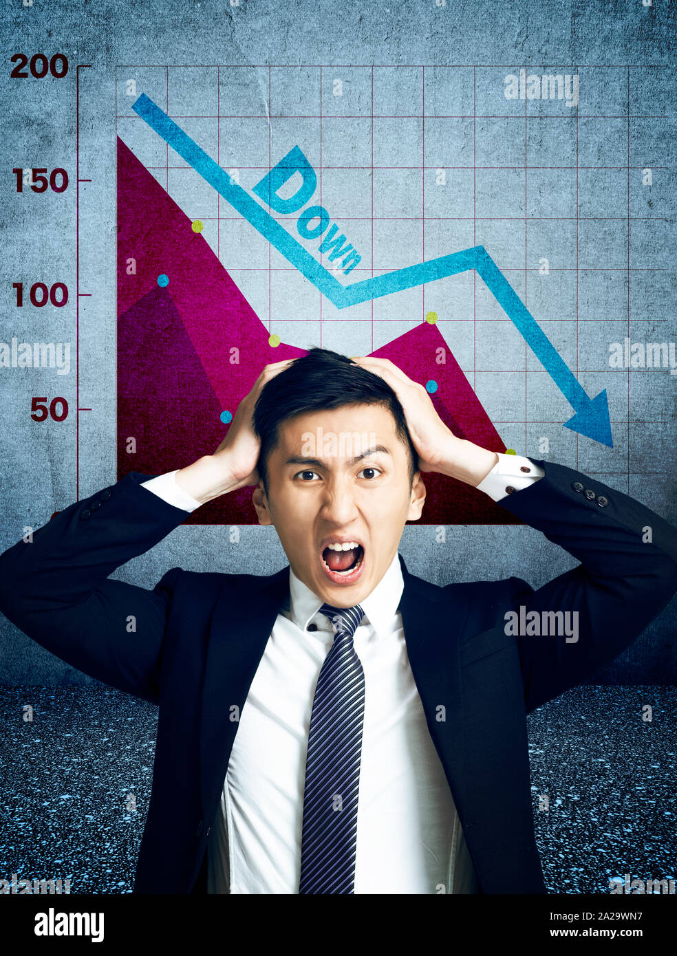 angry businessman watching graph heading down Stock Photo - Alamy