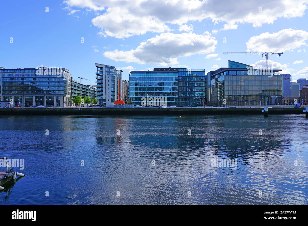DUBLIN, IRELAND -4 MAY 2019- View of construction cranes over buildings ...
