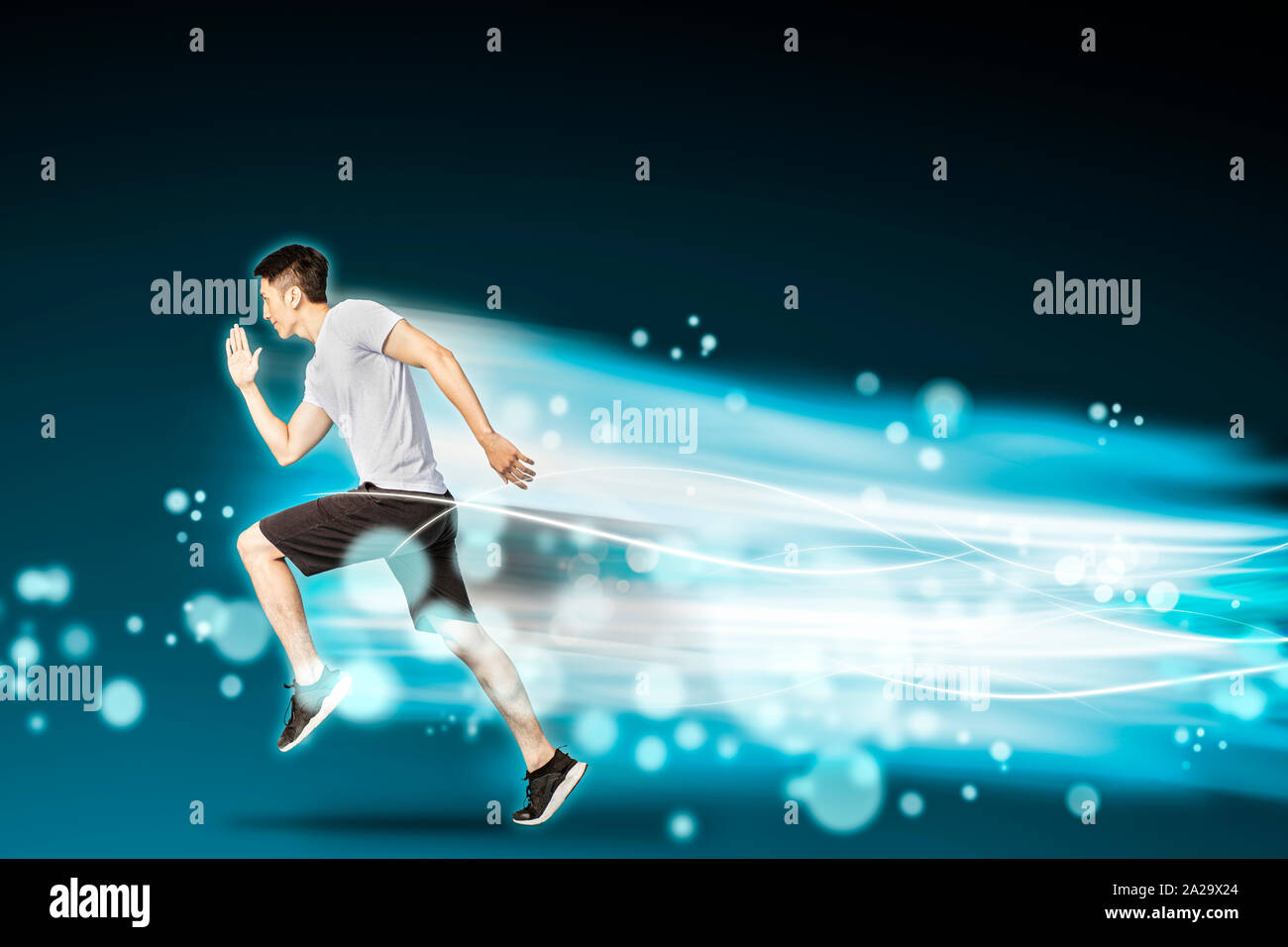 Young man running forward with speed concepts Stock Photo - Alamy