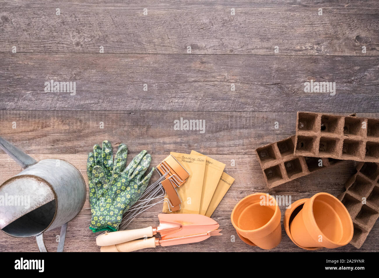 Flat lay. Small garden tools are ready for Spring planting season ...