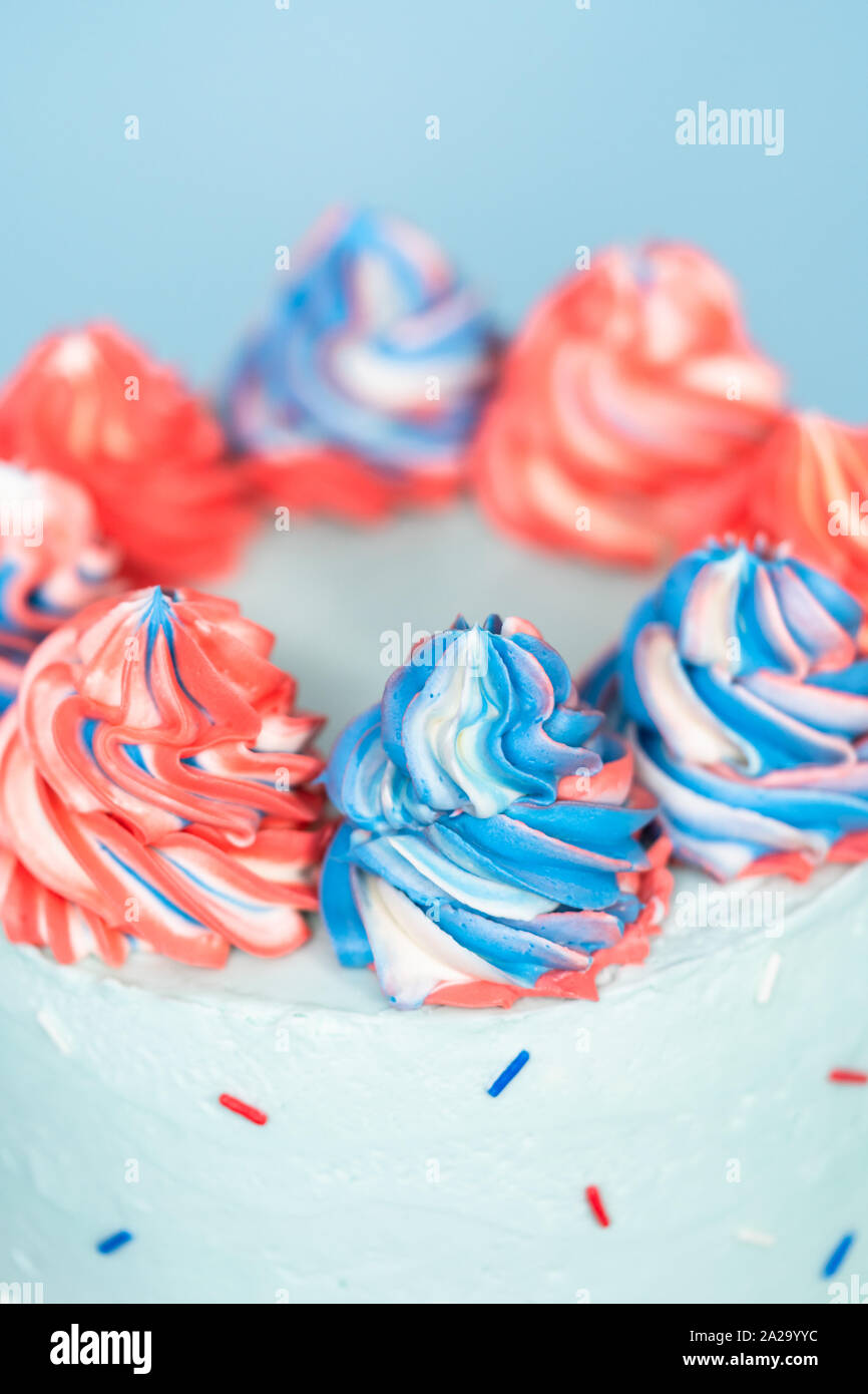 Red, white, and blue round cake frosted with buttercream frosting Stock ...