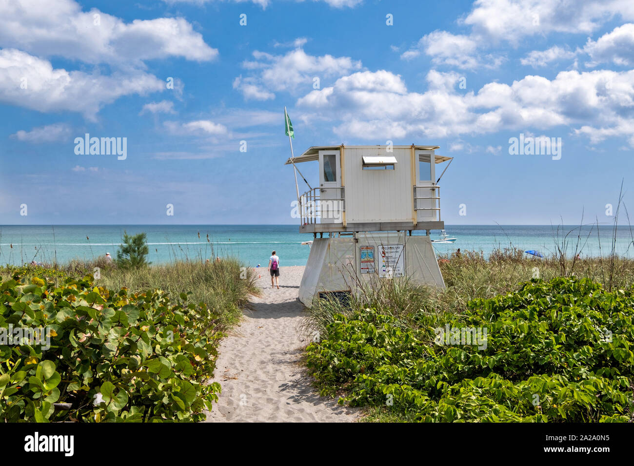 Sandy beach walkway and lifeguard station at Hobe Sound Beach in Hobe ...