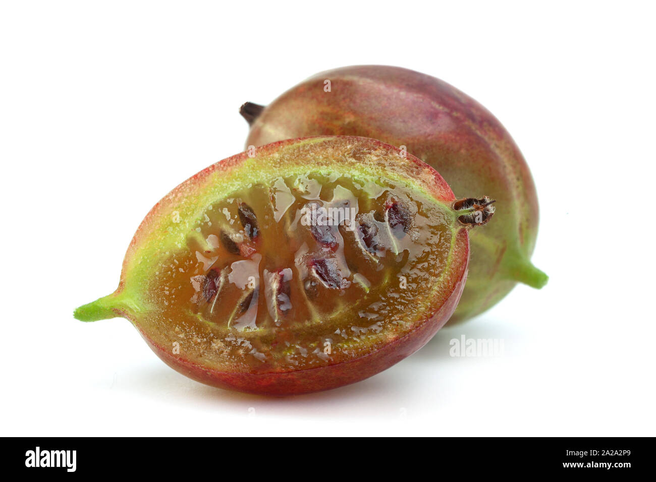 Red gooseberry closeup isolated on white background Stock Photo - Alamy