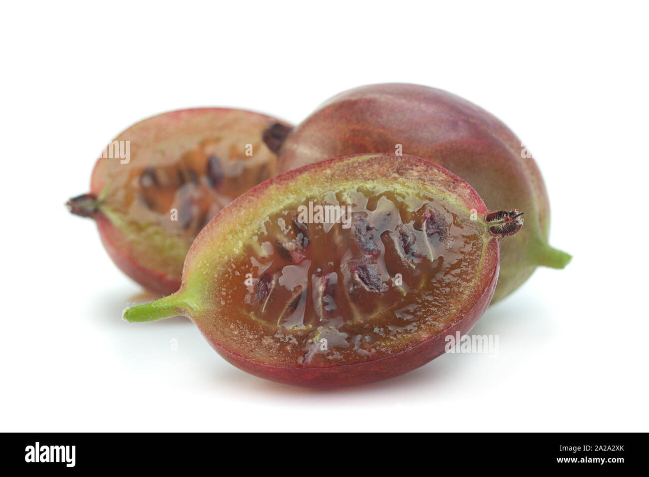 Red gooseberry closeup isolated on white background Stock Photo - Alamy