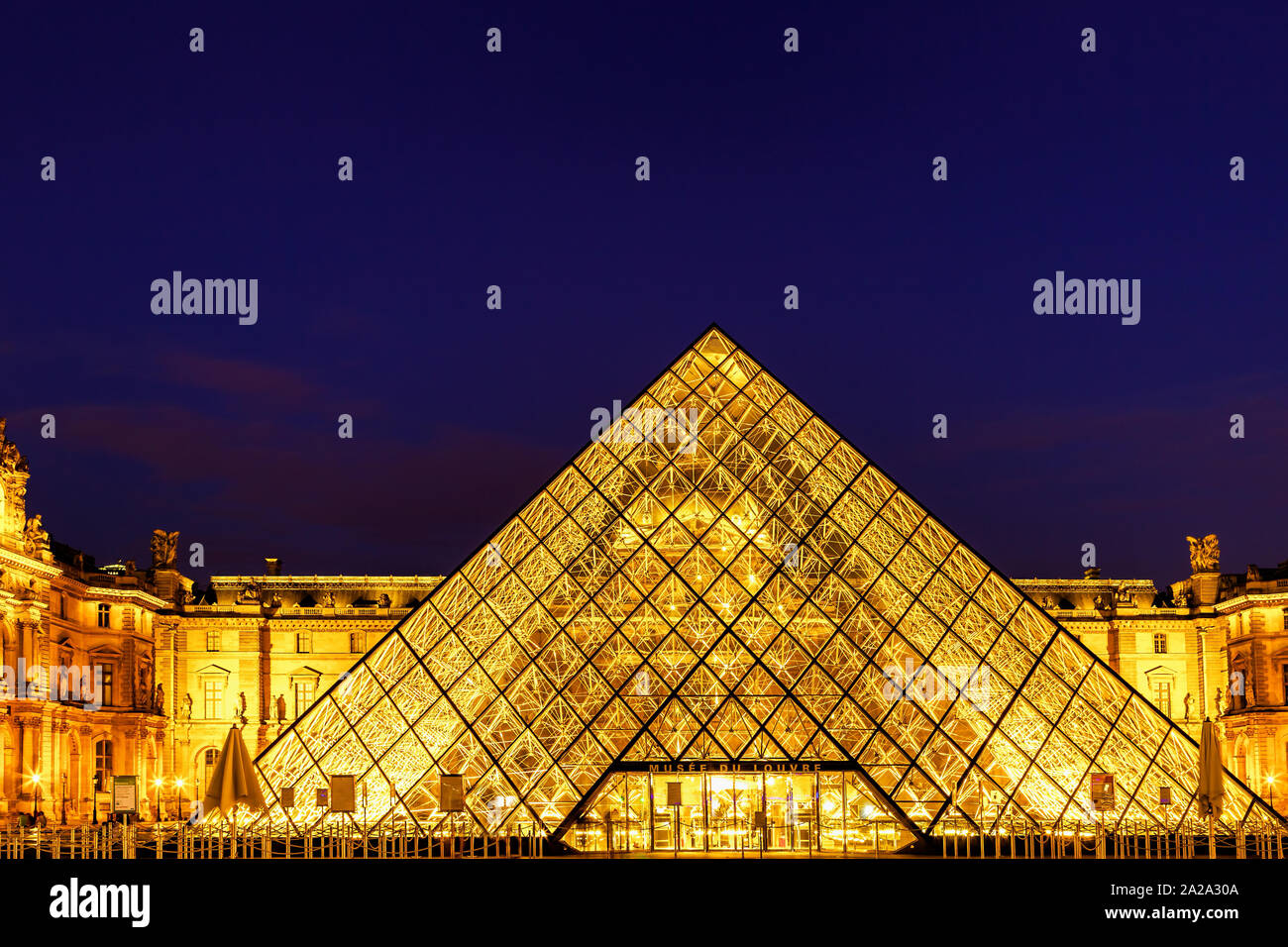 The Louvre and Pyramid illuminated at night Stock Photo - Alamy