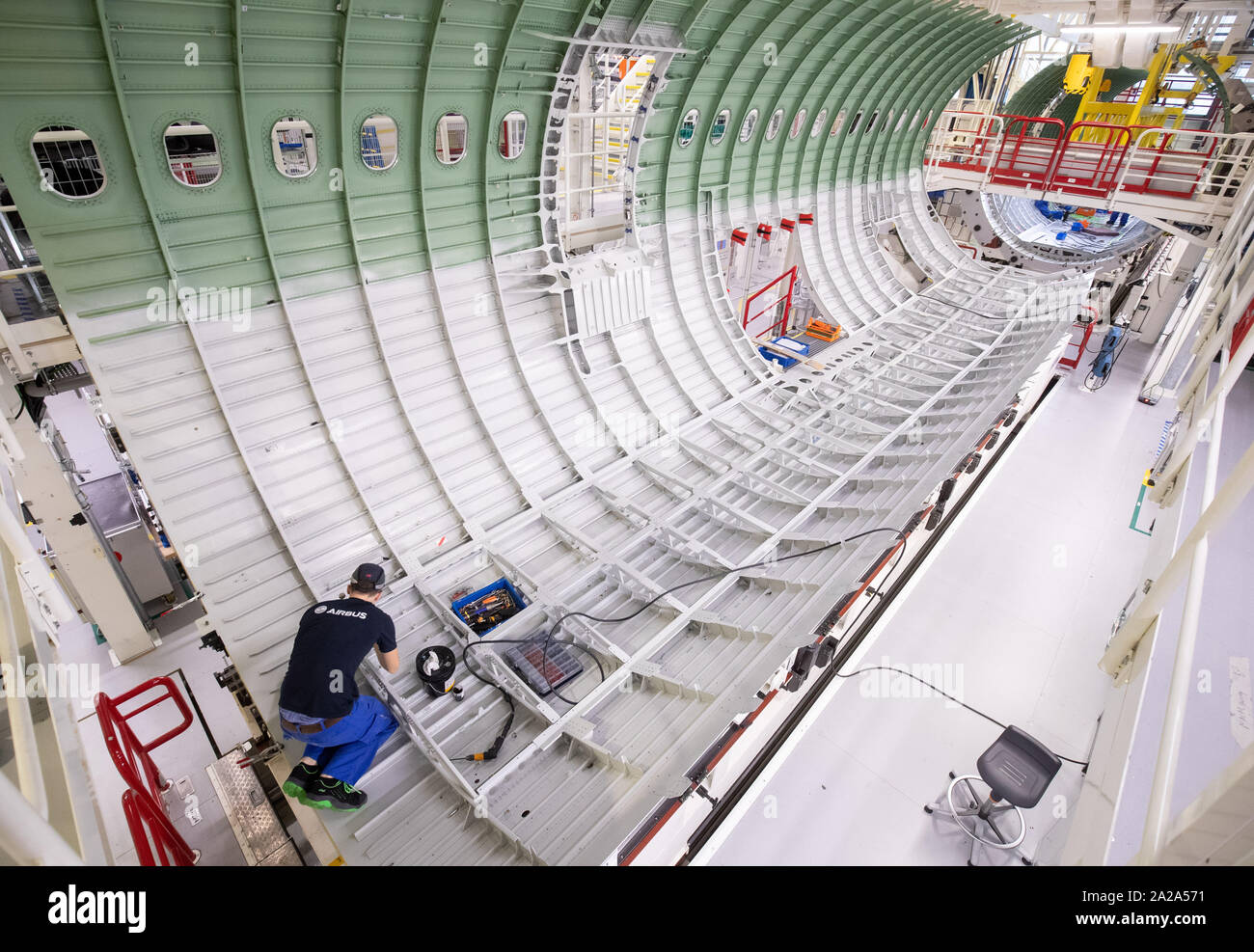 Hamburg, Germany. 01st Oct, 2019. An Airbus technician works in a ...
