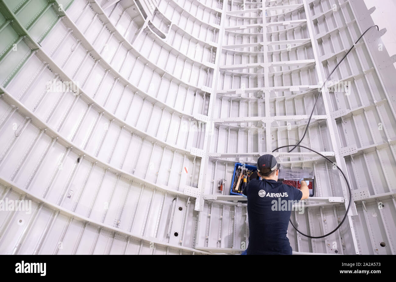 Hamburg, Germany. 01st Oct, 2019. An Airbus technician works in a ...