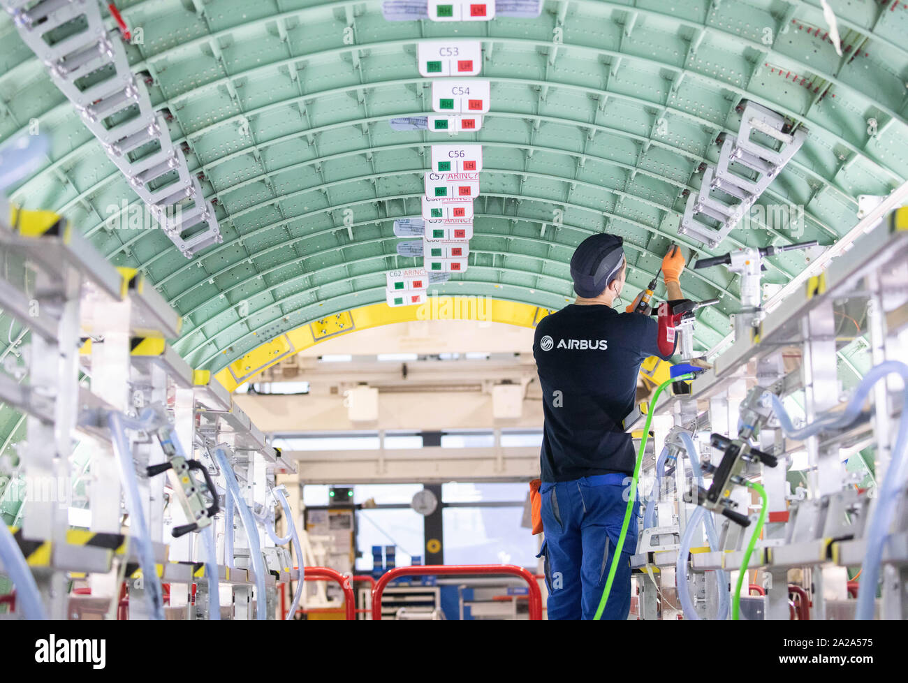 Hamburg, Germany. 01st Oct, 2019. An Airbus technician works in a ...