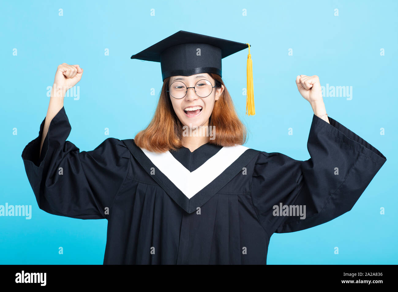 happy and excited success graduation girl Stock Photo - Alamy