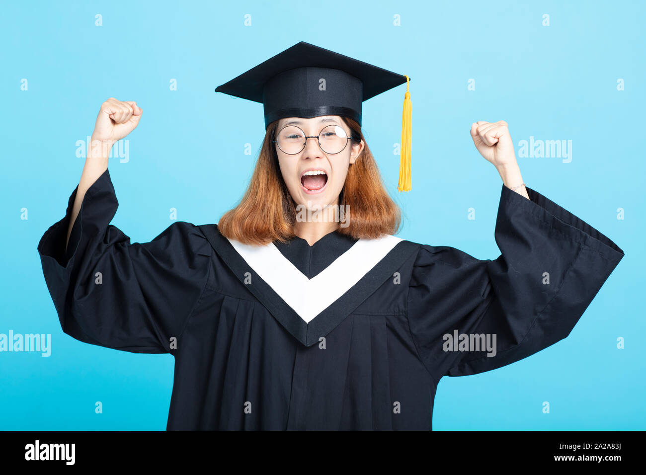 happy and excited success graduation girl Stock Photo - Alamy