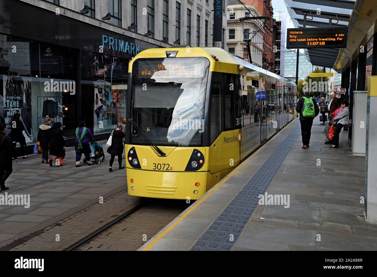 A Metrolink tram arrives at Market Street tram stop, Greater Manchester ...