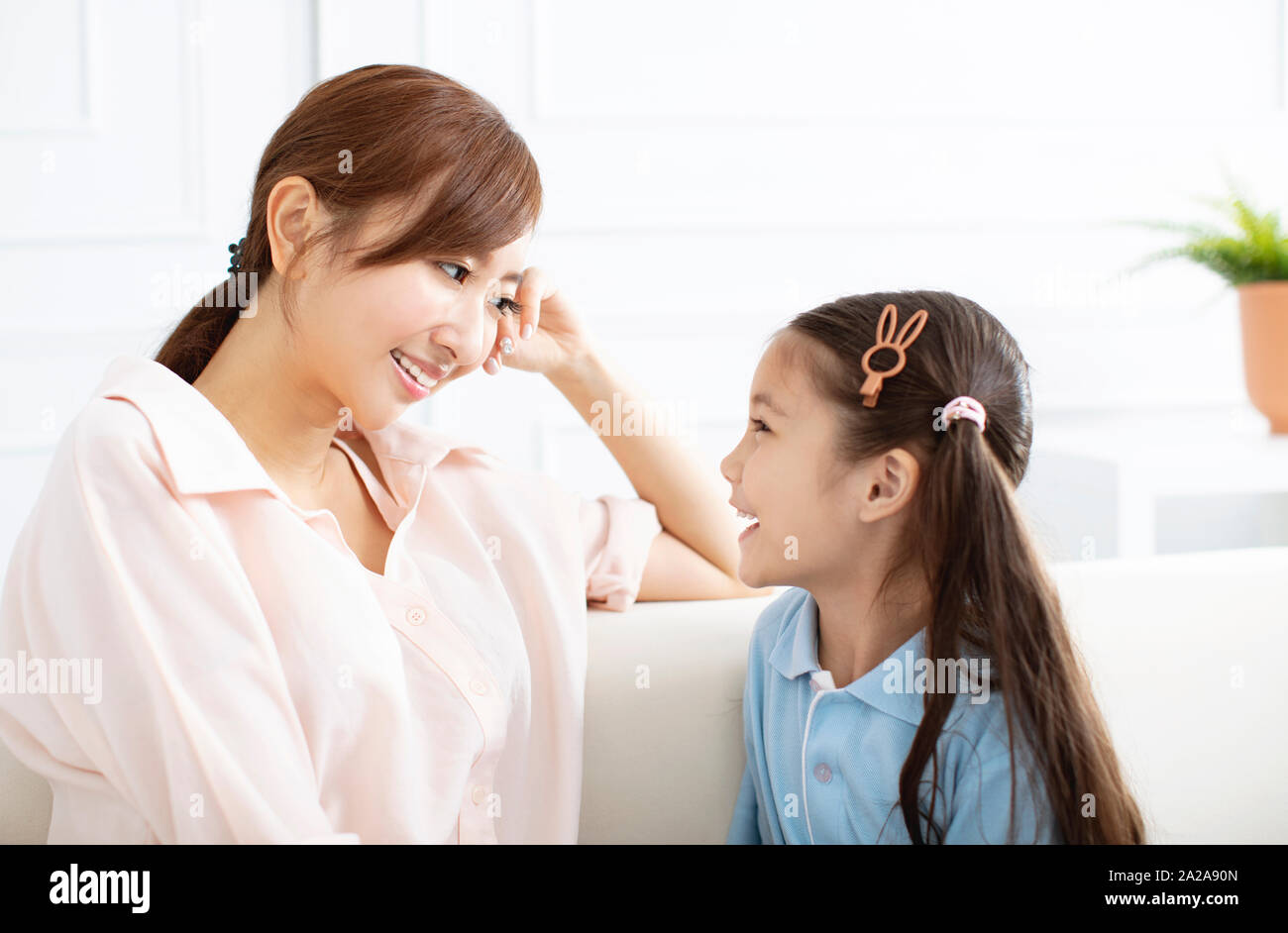 Pretty cute happy smiling talking hi-res stock photography and images ...